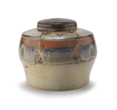 A stoneware jar and cover, Hyme Rabinowitz (1920-2009) with blue and ...