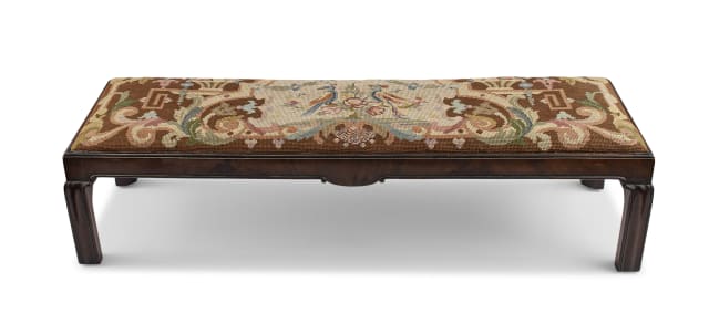 An Edwardian mahogany and needlework fire stool | Strauss & Co