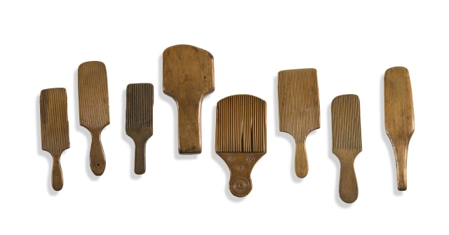 A collection of eight butter pats | Strauss & Co
