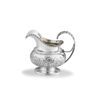 A George III silver-gilt milk jug, John Edward Terry, London, 1818 the ...