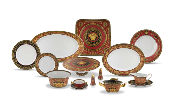 A Rosenthal Versace red, gilt and black 'Medusa' pattern dinner service ...