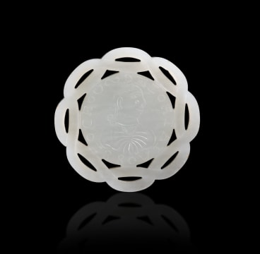 A Chinese pale celadon jade 'coin' pendant, Qing Dynasty, 19th century ...
