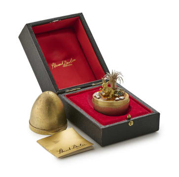 A Stuart Devlin silver-gilt and enamel novelty surprise egg, London ...