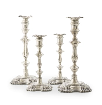 A set of four George V silver candlesticks, William Hutton & Sons Ltd ...