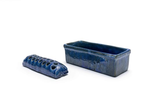 Blue rectangular trough with flower frog by Linn Ware | Strauss & Co