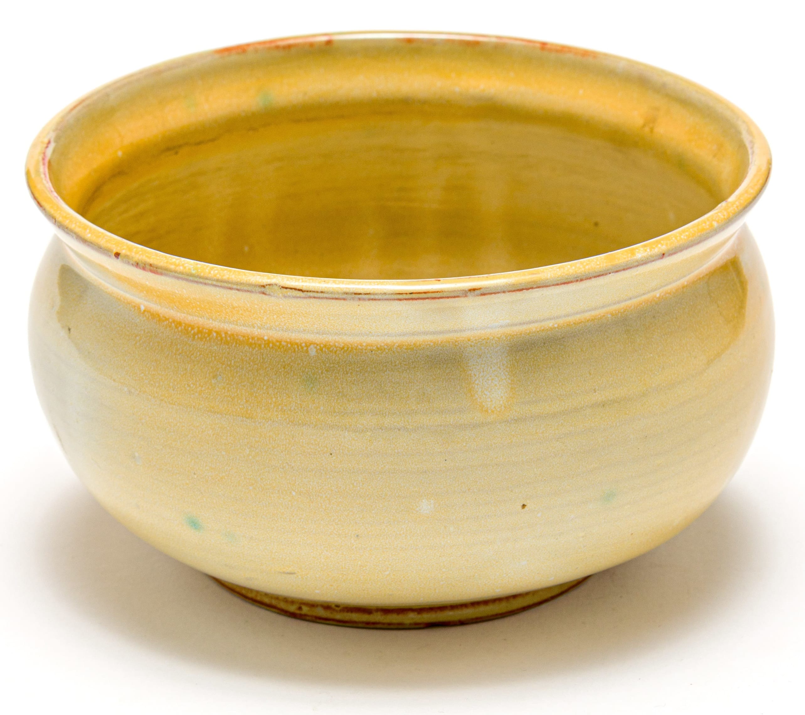 A Linn Ware apricot-coloured glazed bowl | Strauss & Co