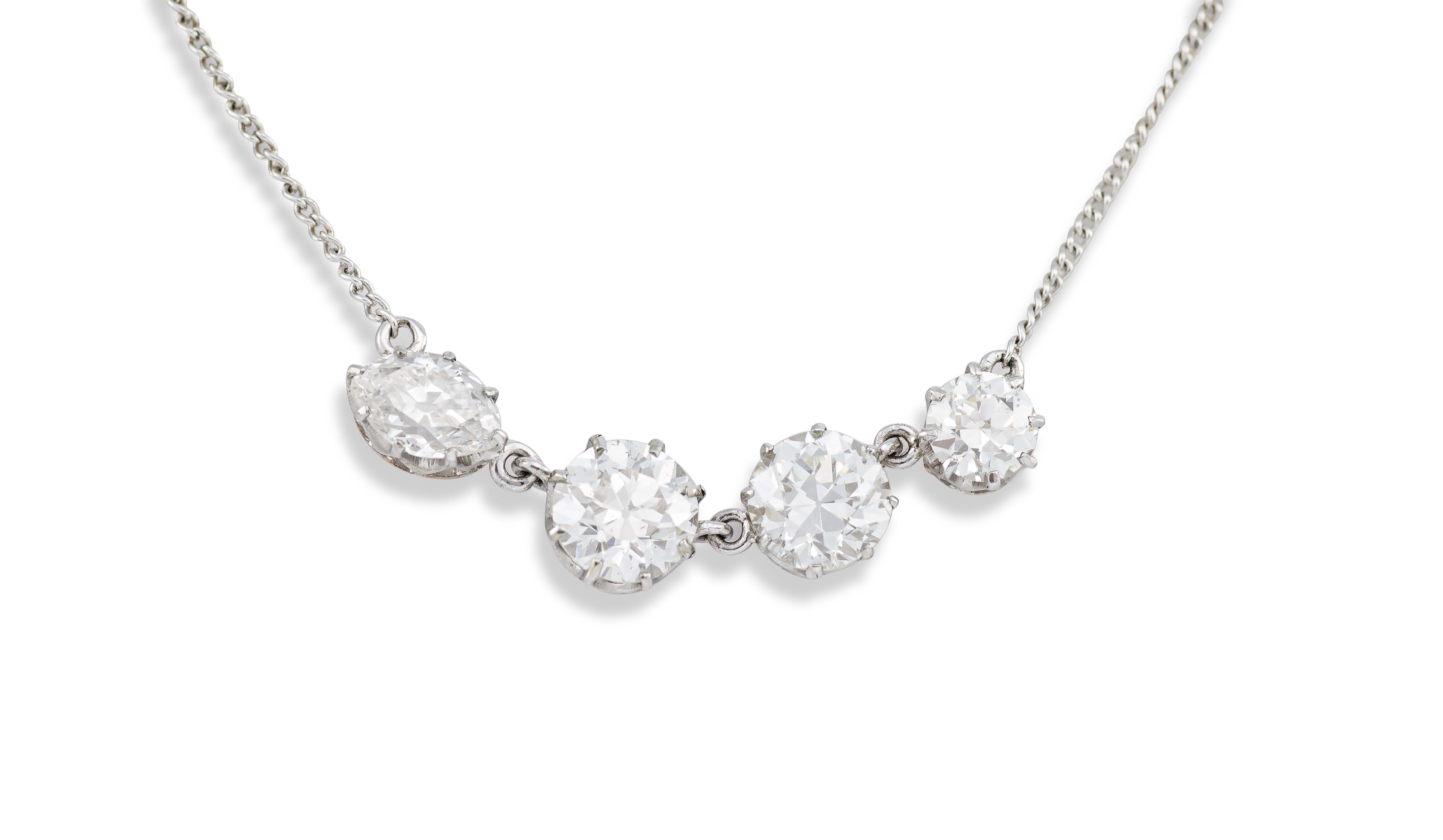 Four stone diamond and 18ct white gold necklet | Strauss & Co