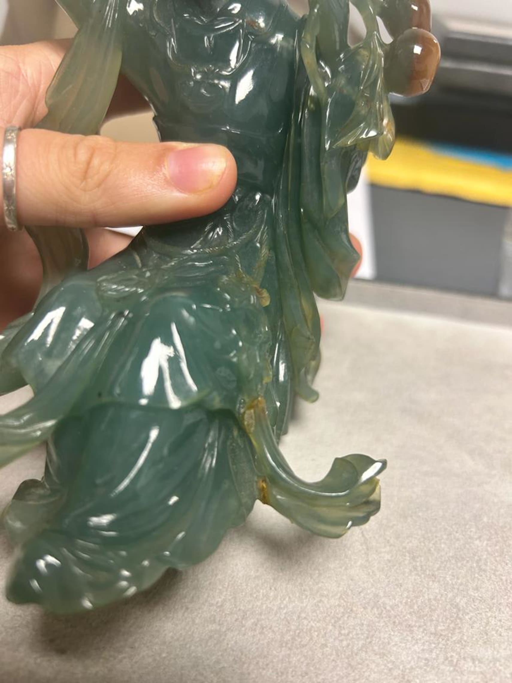 A Chinese carved jade figurine, Qing Dynasty, 20th century | Strauss & Co