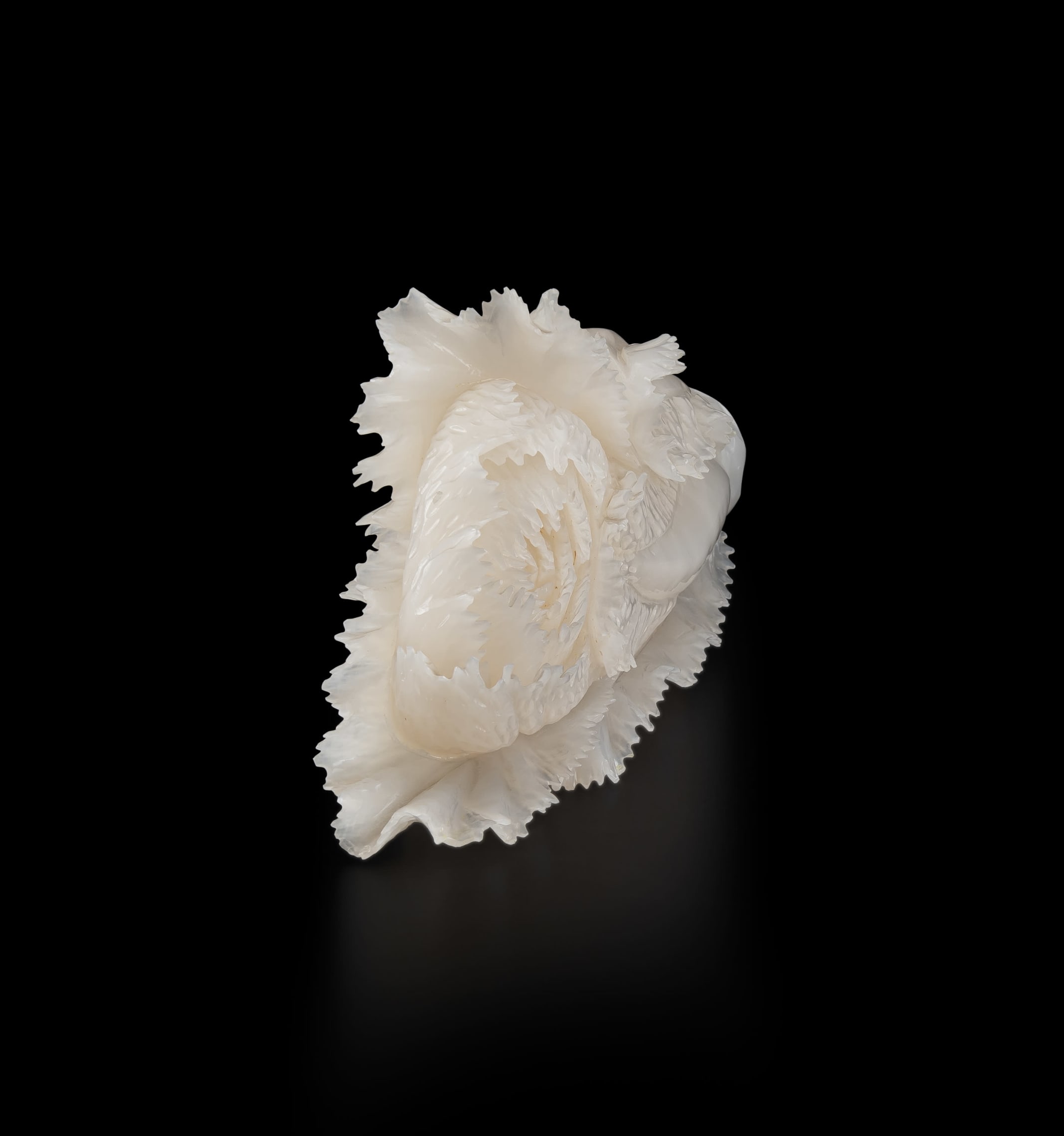 A Chinese carved jade cabbage, late 19th/early 20th century | Strauss & Co