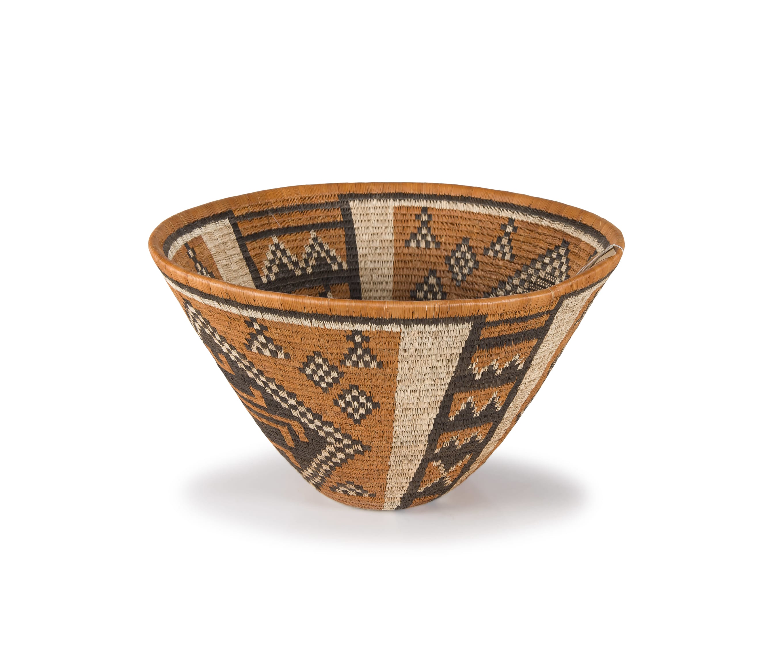 A Botswanan coiled mokolwane palm leaf woven basket by Unrecorded ...
