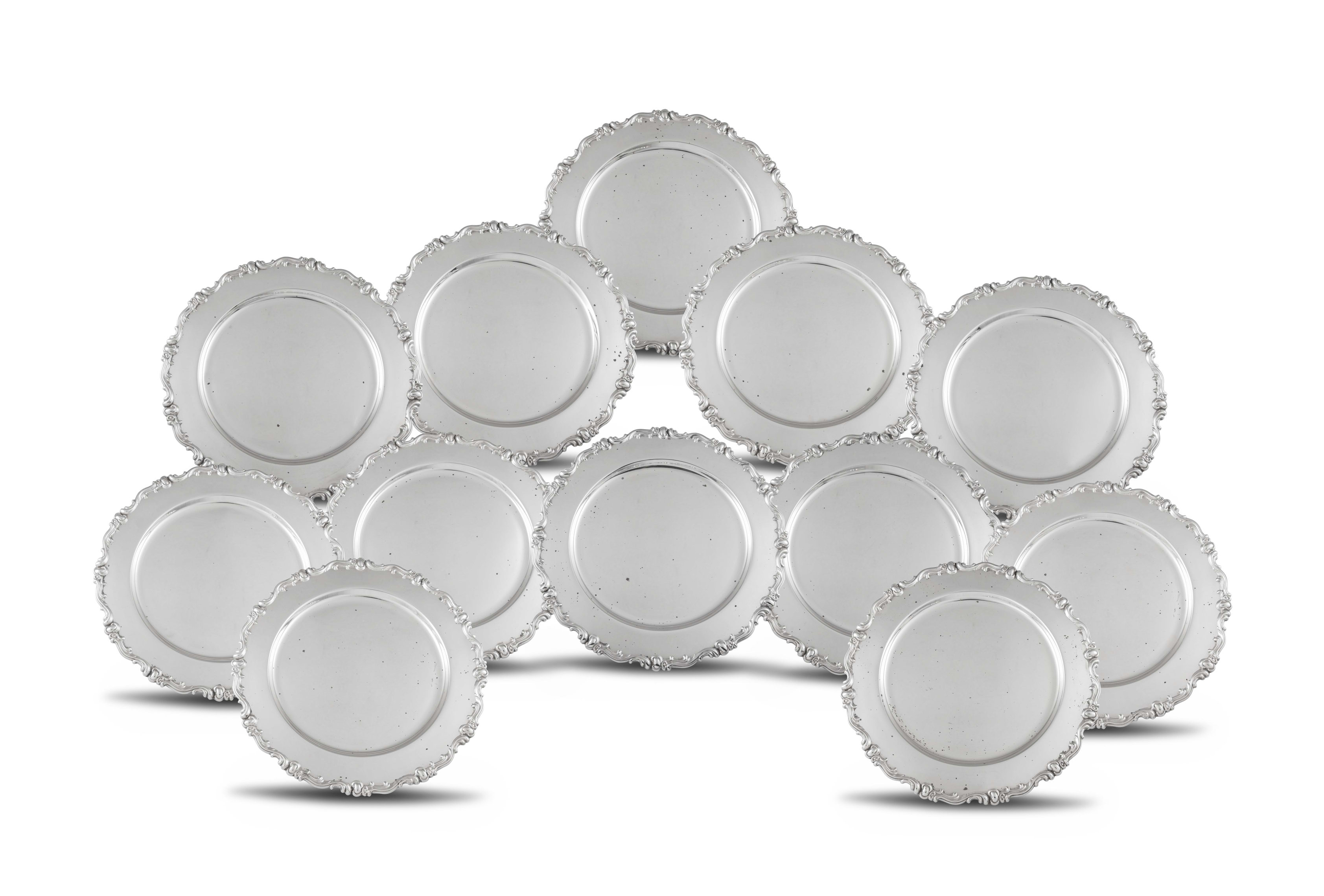 A set of twelve Peruvian silver underplates, Camusso, 20th century ...
