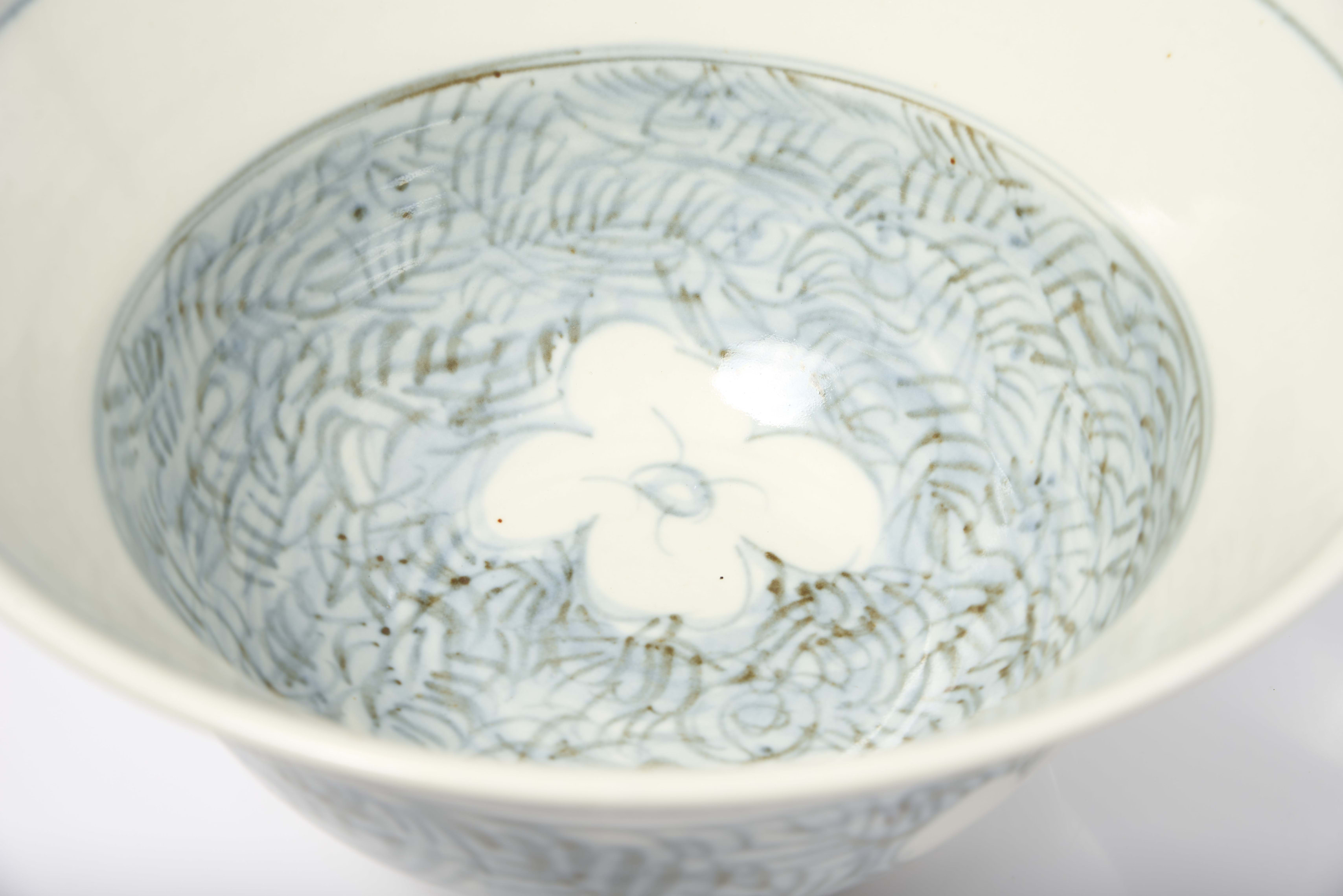 Large flared conical bowl with flower motif by Esias Bosch | Strauss & Co